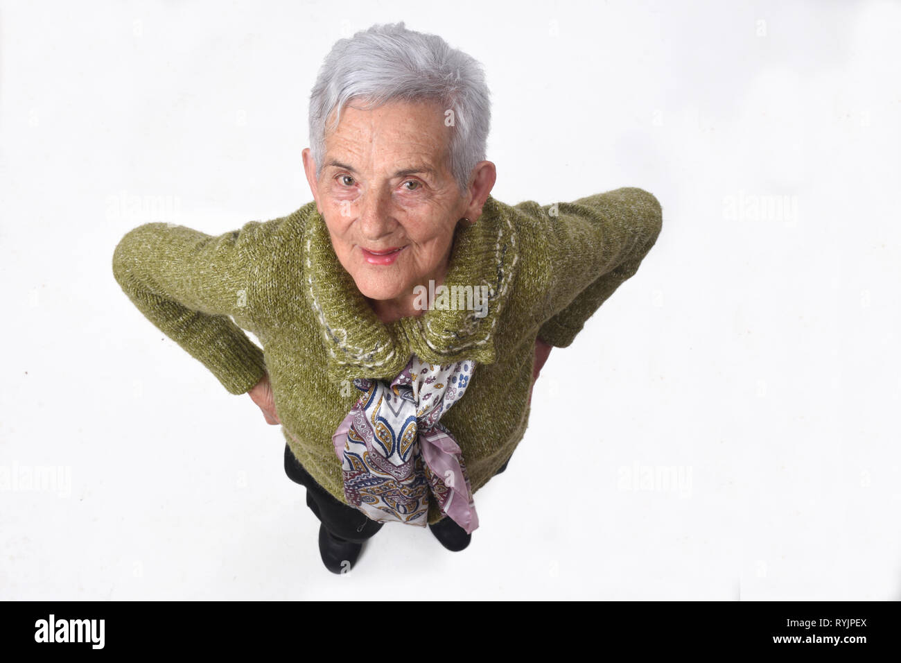 portrait view from above of an older woman on white background Stock ...
