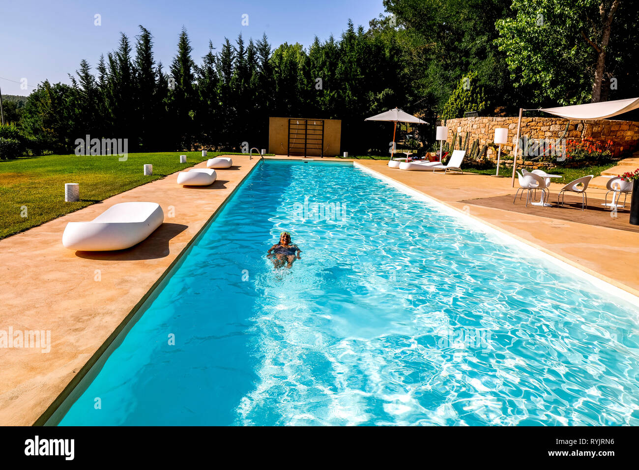 Bathing in a pool hi-res stock photography and images - Alamy