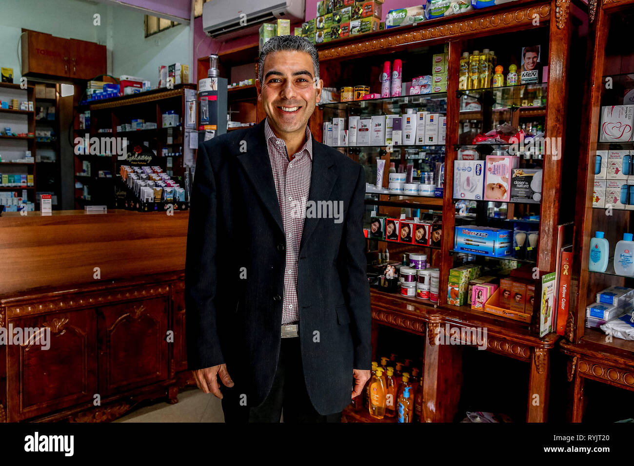 Emadeddin Mahmud Shedahih, a pharmacist in Jalazone refugee camp, West ...