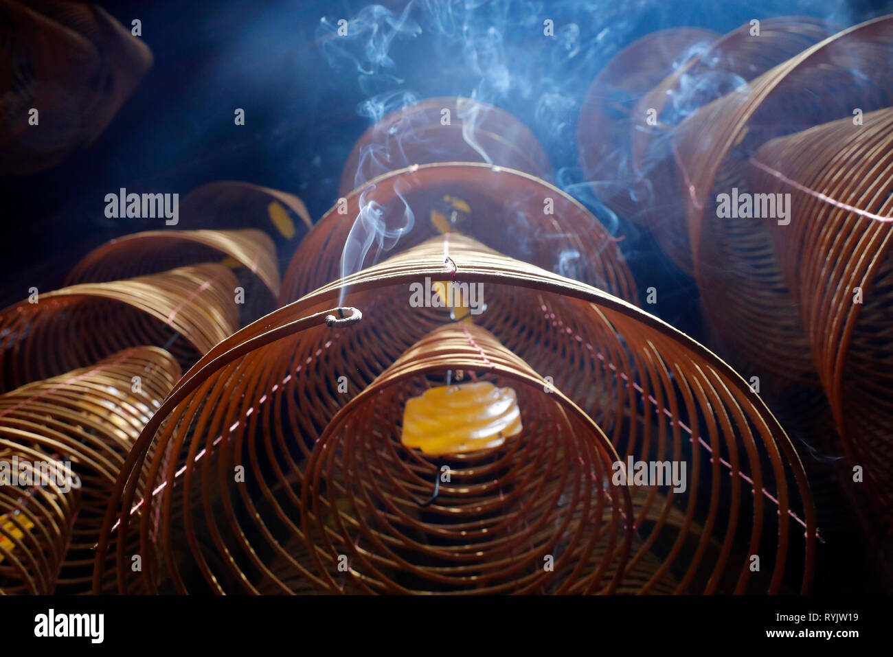 Taoist Ong pagoda. Incense coils hang from the ceiling. Can Tho ...