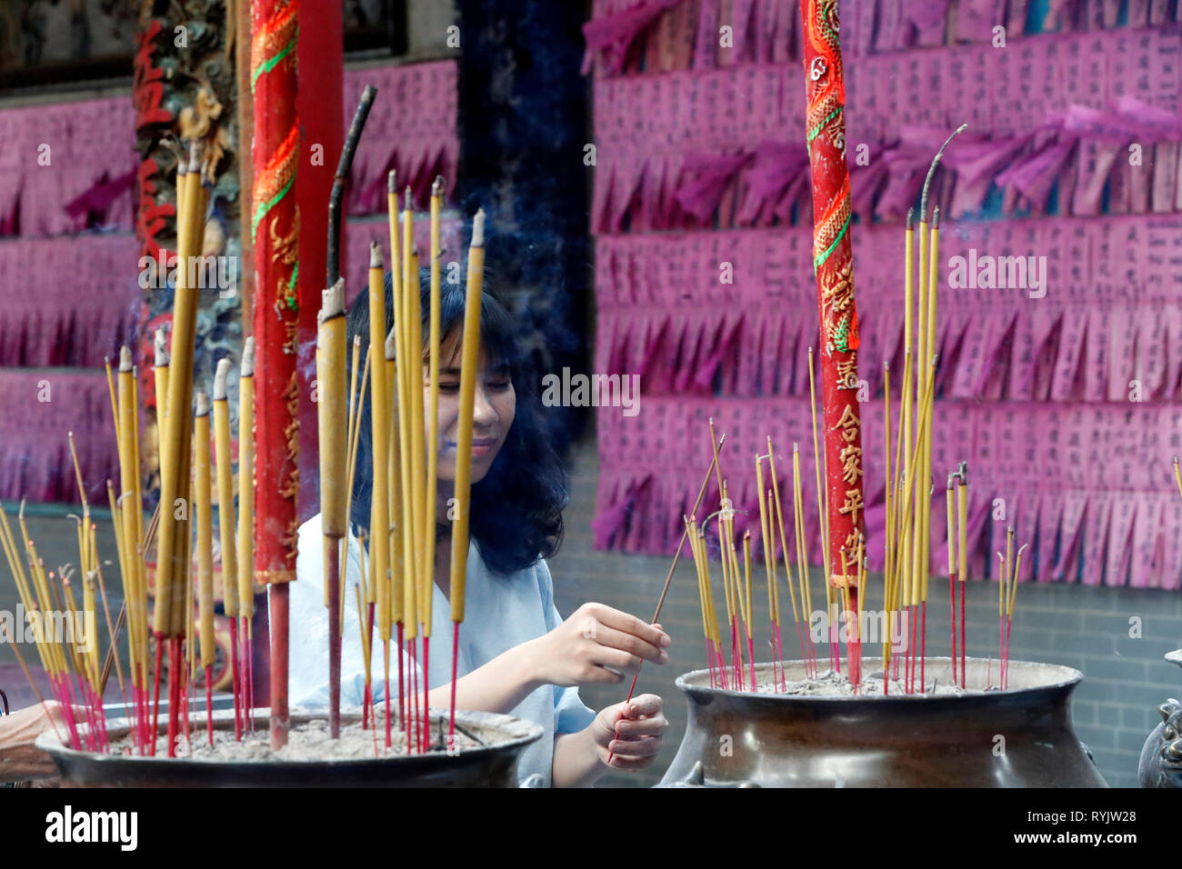 Taoist temple. Phuoc An Hoi Quan Pagoda. Incense sticks on joss stick ...