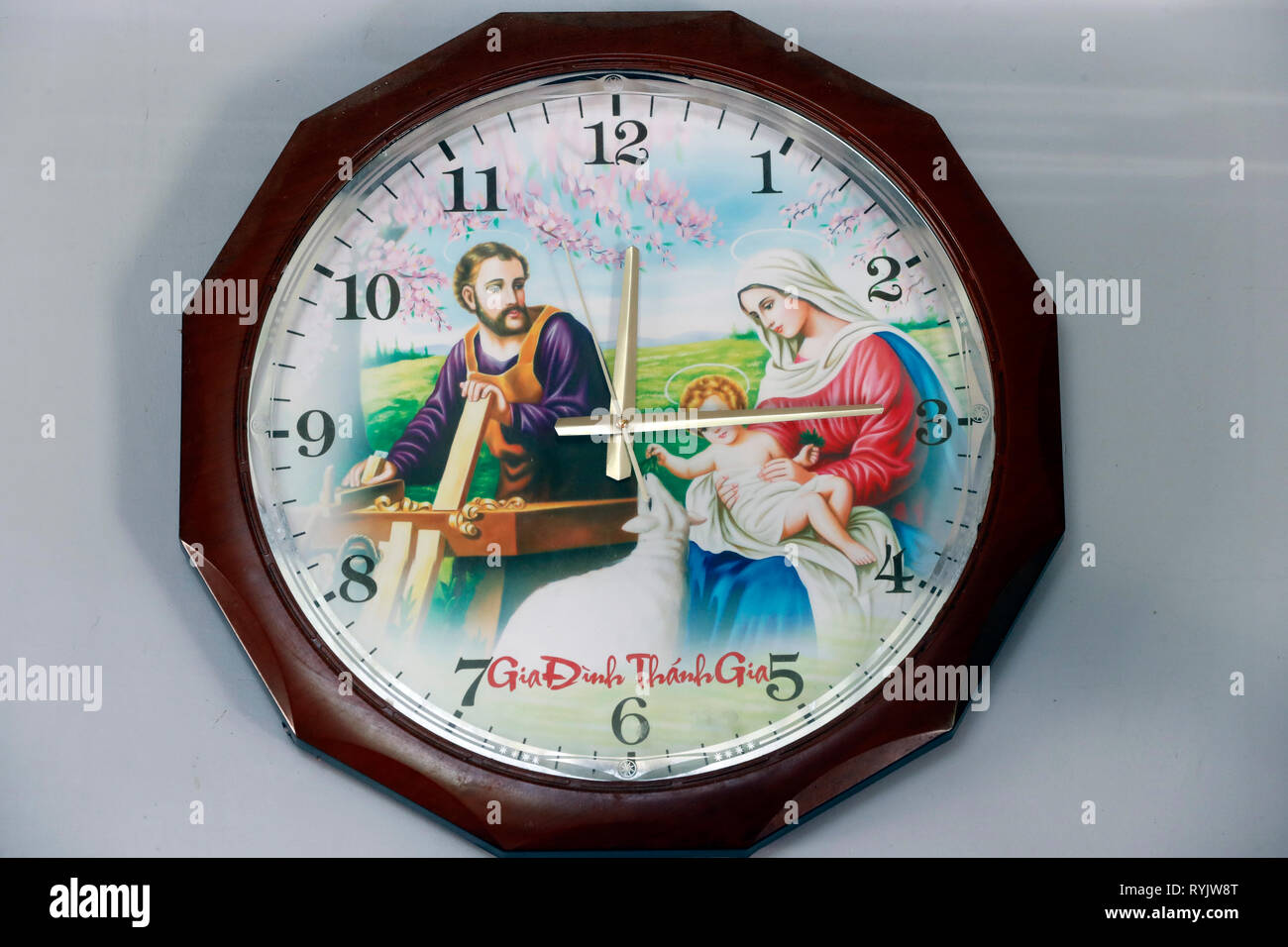 The Holy family on a clock. Dalat. Vietnam Stock Photo - Alamy
