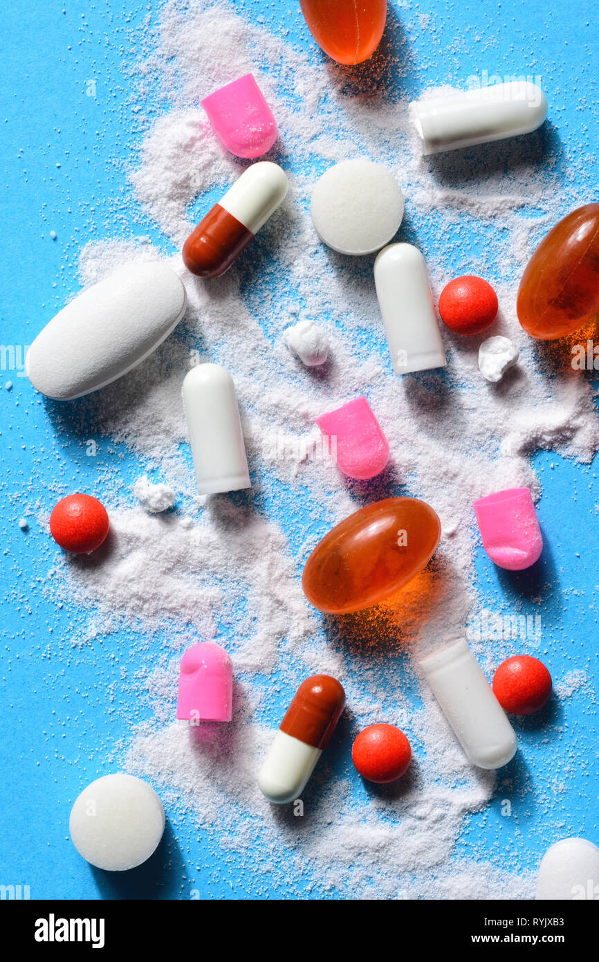 capsules pills broken with your powder medication Stock Photo - Alamy