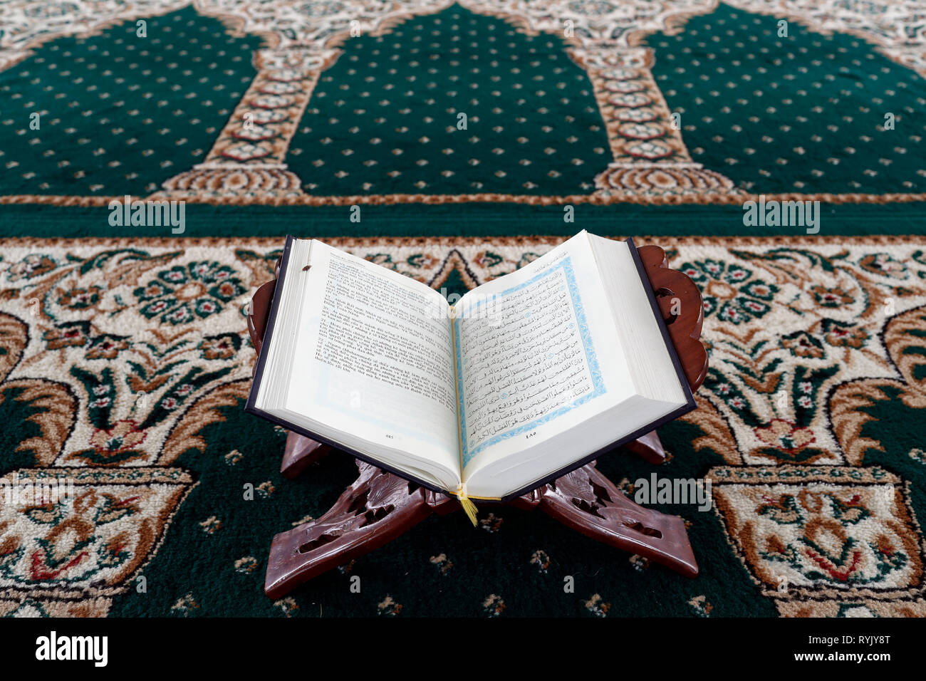 Masjid Al Ehsan mosque. Open Quran on wood stand. Vietnamese ...