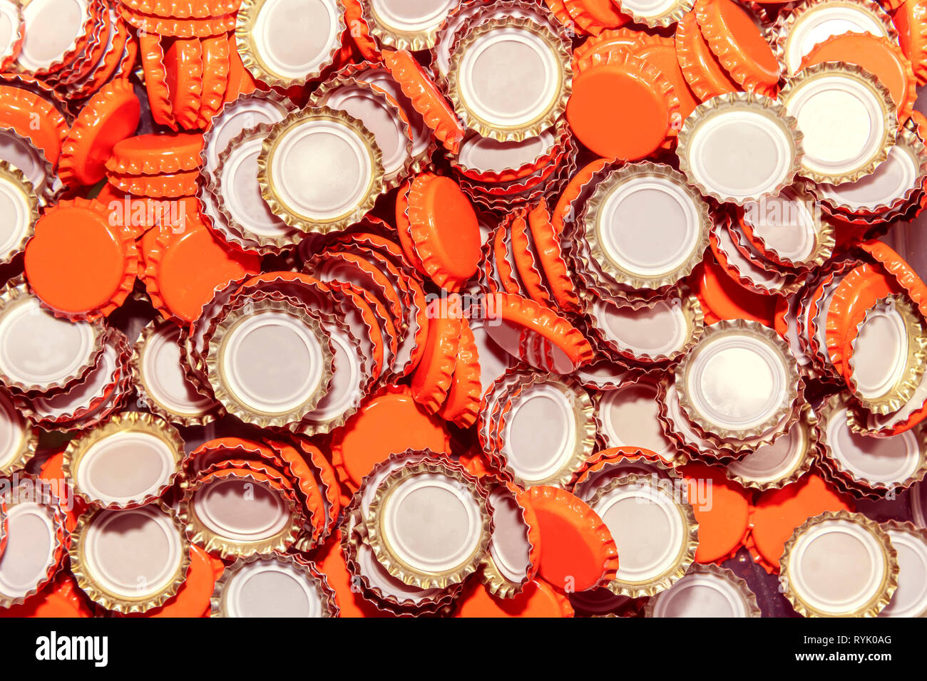close-up of orange color capsule of bottles for various industrial or ...