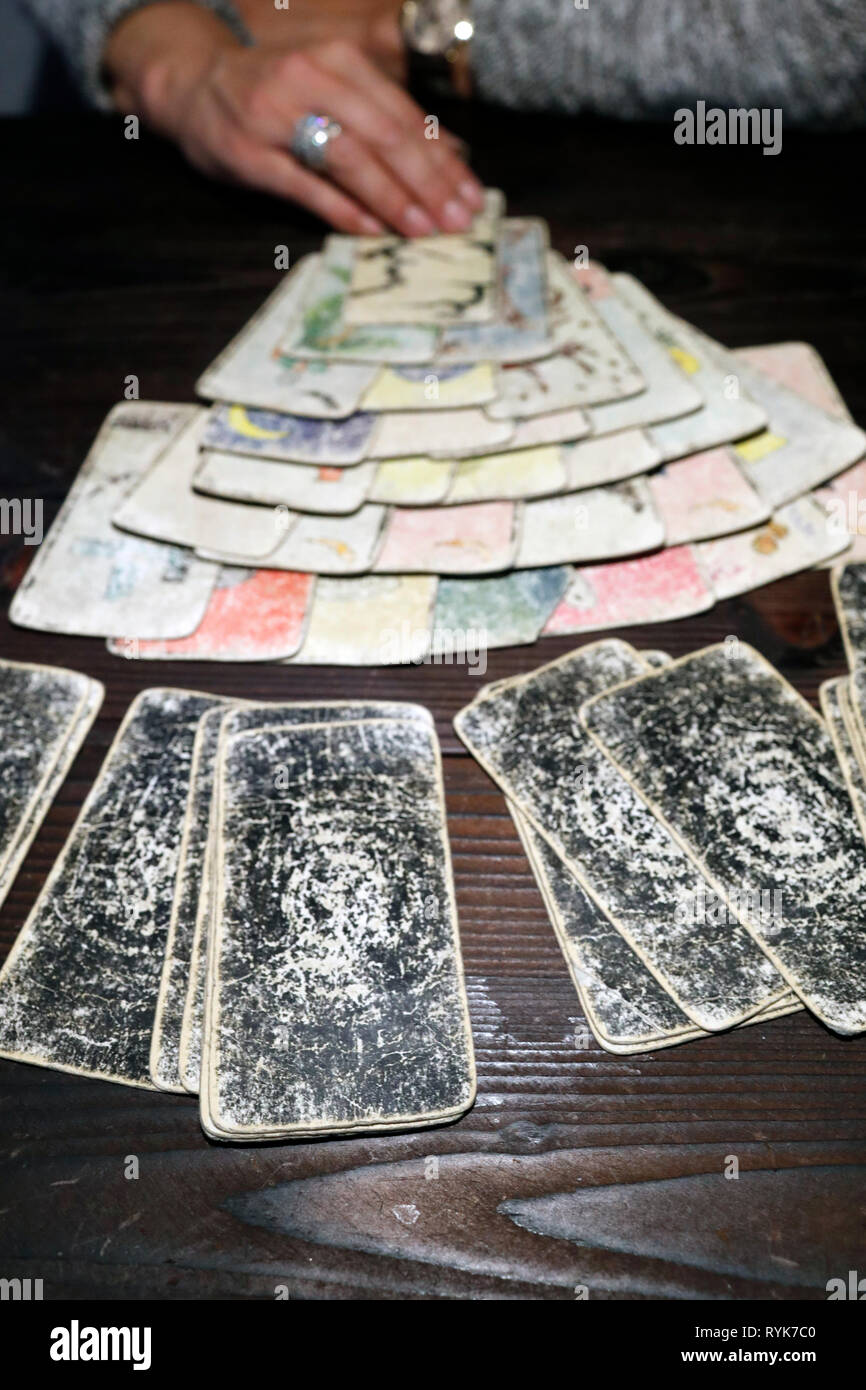 Fortuneteller Laying Cards on the Table. France Stock Photo - Alamy