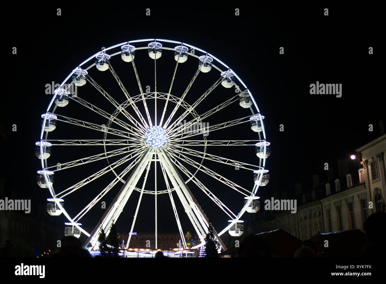 Ferris wheel at the night. Bright and futuristic cityscape Stock Photo ...