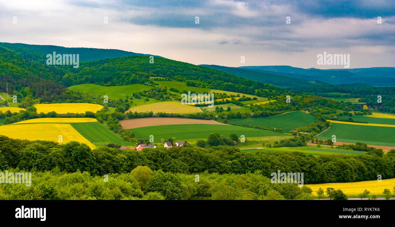 Lovely panoramic landscape view of the Werra Valley. Green, yellow and ...