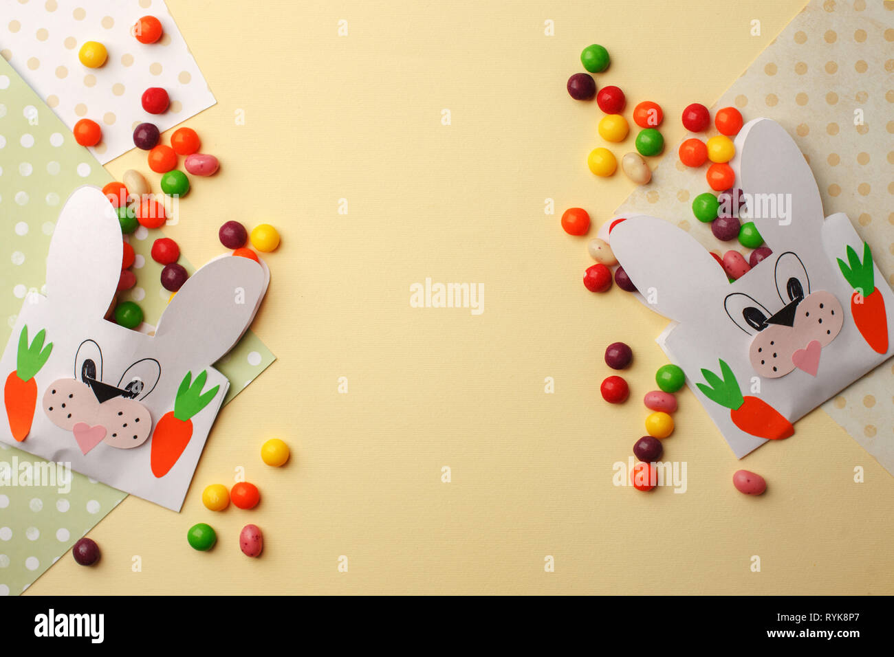 Easter colorful candy and Jellybean flowing from party paper handcraft ...