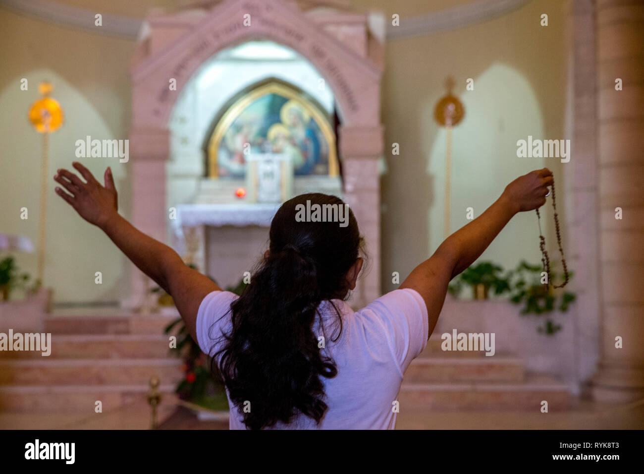 Back view of person praying in church hi-res stock photography and ...