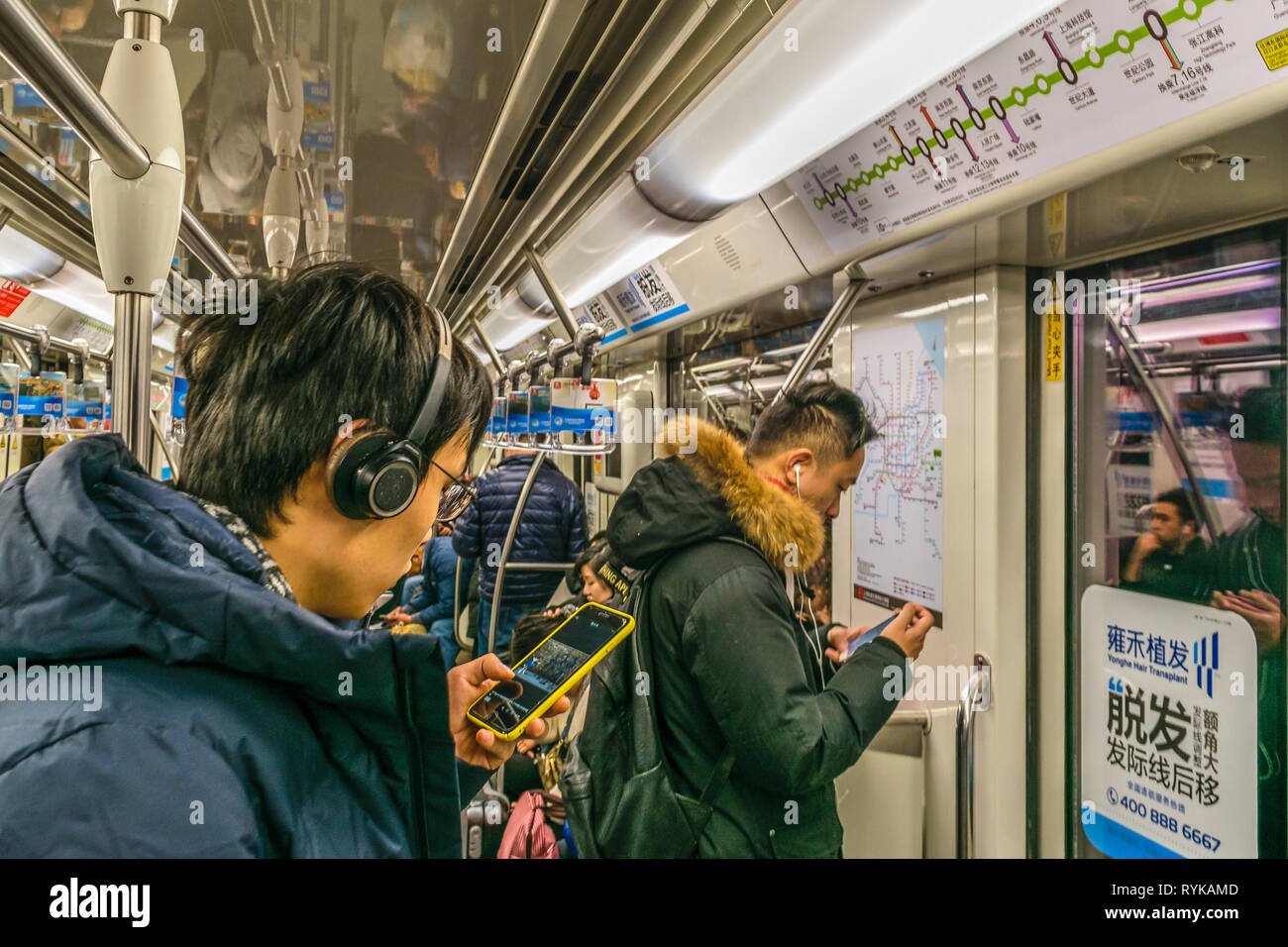 SHANGHAI, CHINA, DECEMBER - 2018 - Interior view of busy subway at ...
