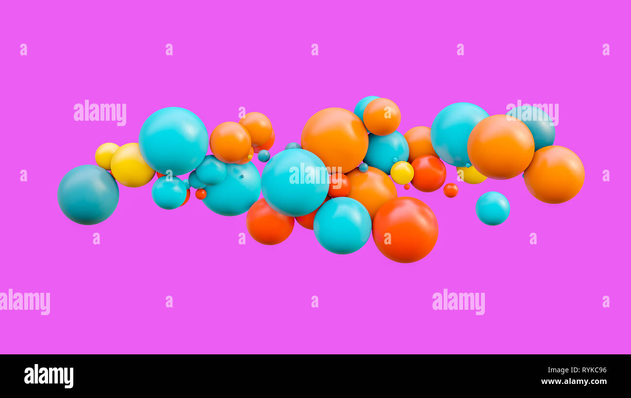 Flying spheres isolated on pink background Stock Photo - Alamy
