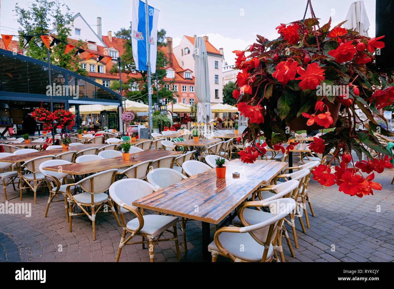 Flowers at Terrace street cafe in the Old Town of Riga in Latvia Stock ...