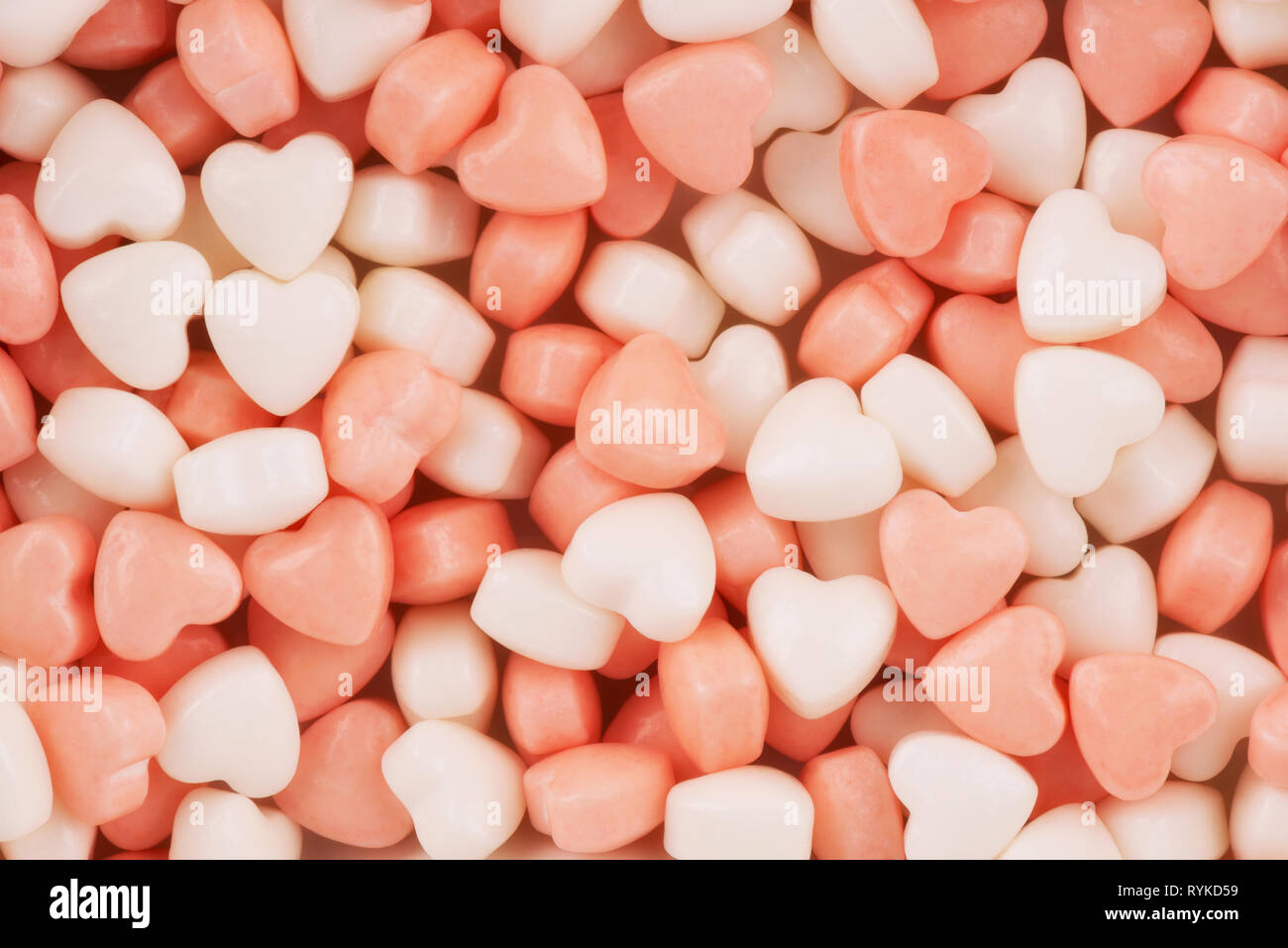 Extremely close up on small heart shaped candies. Valentines day ...