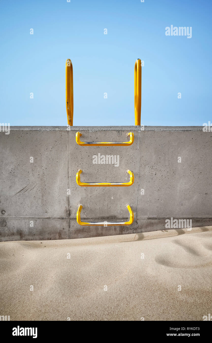 Steel ladder embedded in a concrete wall, conceptual picture Stock ...