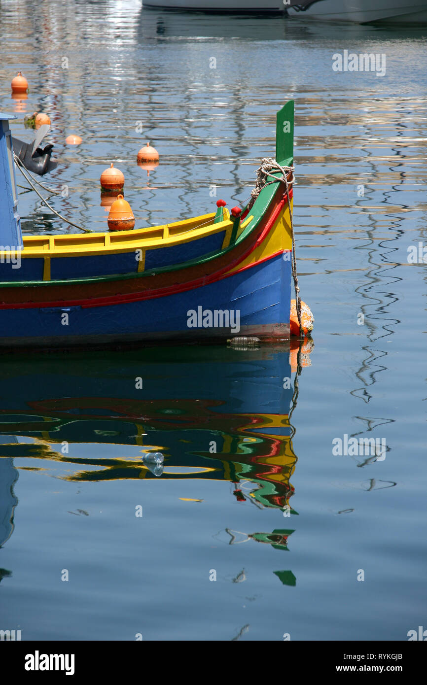 Luzzu and reflection Stock Photo - Alamy