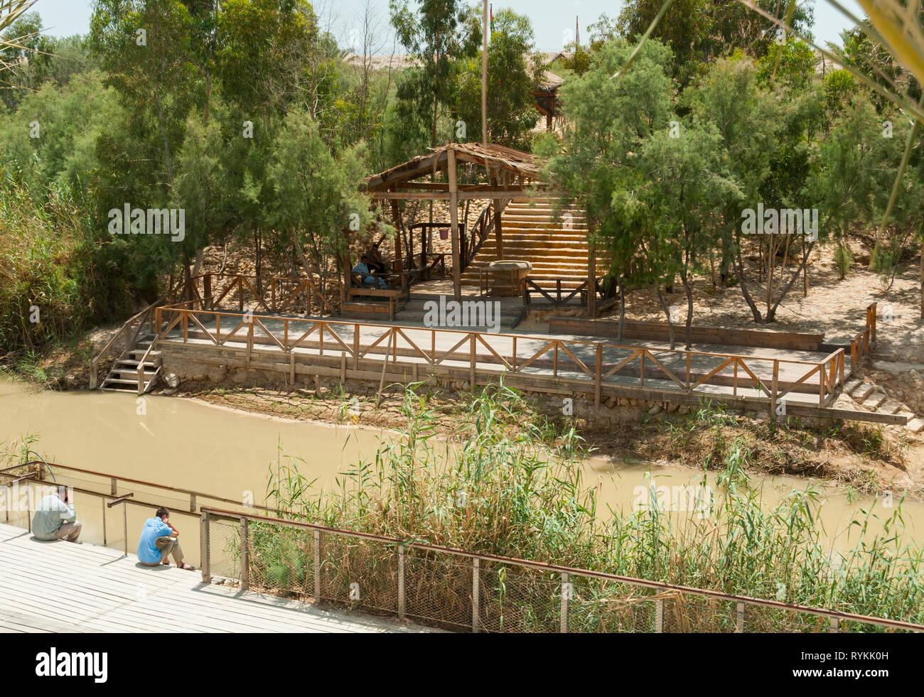 Qasr el Yahud,ISrael,25-,may-2010: people sitting at the Baptismal site ...