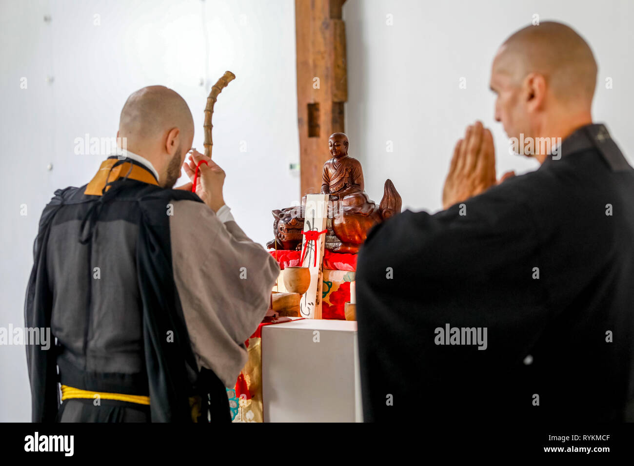 Zen sesshin (retreat) in Paris, France. Master performing a ritual ...