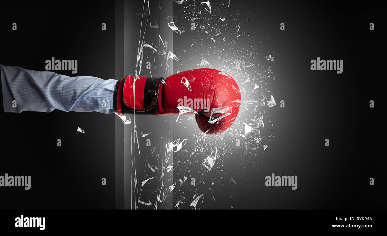 Big hand hits intense and breaks glasses Stock Photo - Alamy