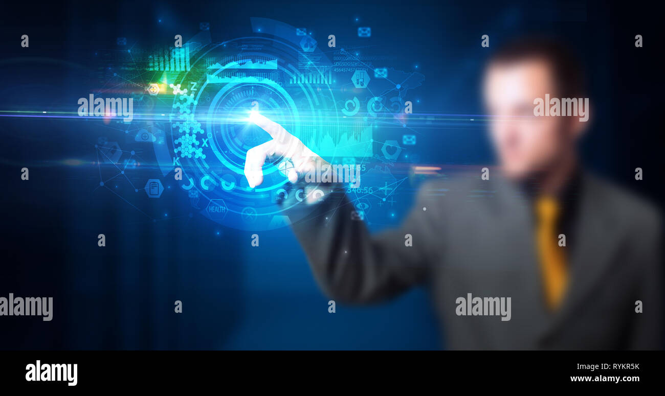 Man touching hologram screen displaying medical symbols and charts ...