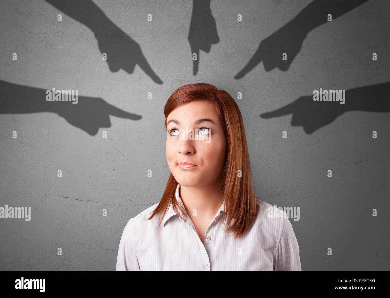 Young innocent student with pointing hands concept Stock Photo - Alamy