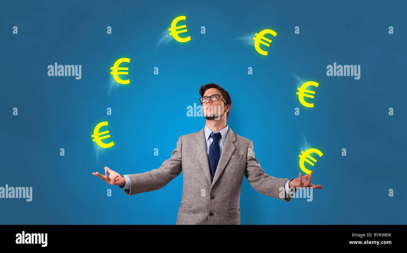 Young happy person juggle with euro symbol Stock Photo - Alamy