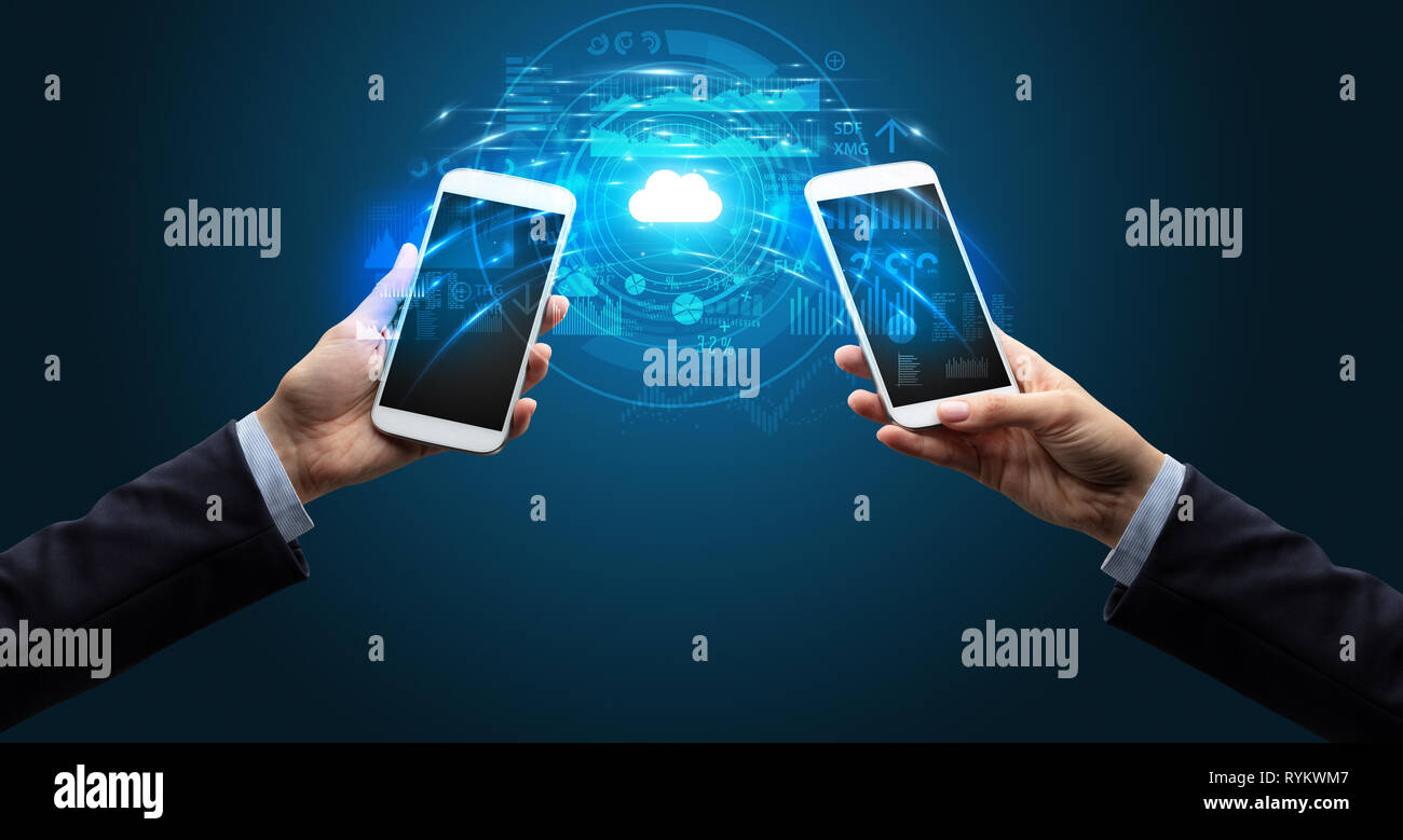 Two mobile phones syncing through the cloud Stock Photo - Alamy