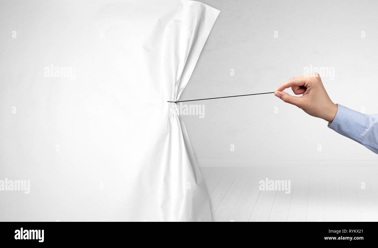 hand pulling white paper curtain, changing scene concept Stock Photo ...