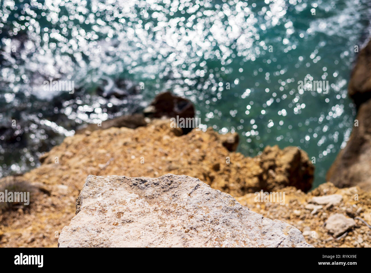 Wave breaking against cliff ,view from above Stock Photo - Alamy