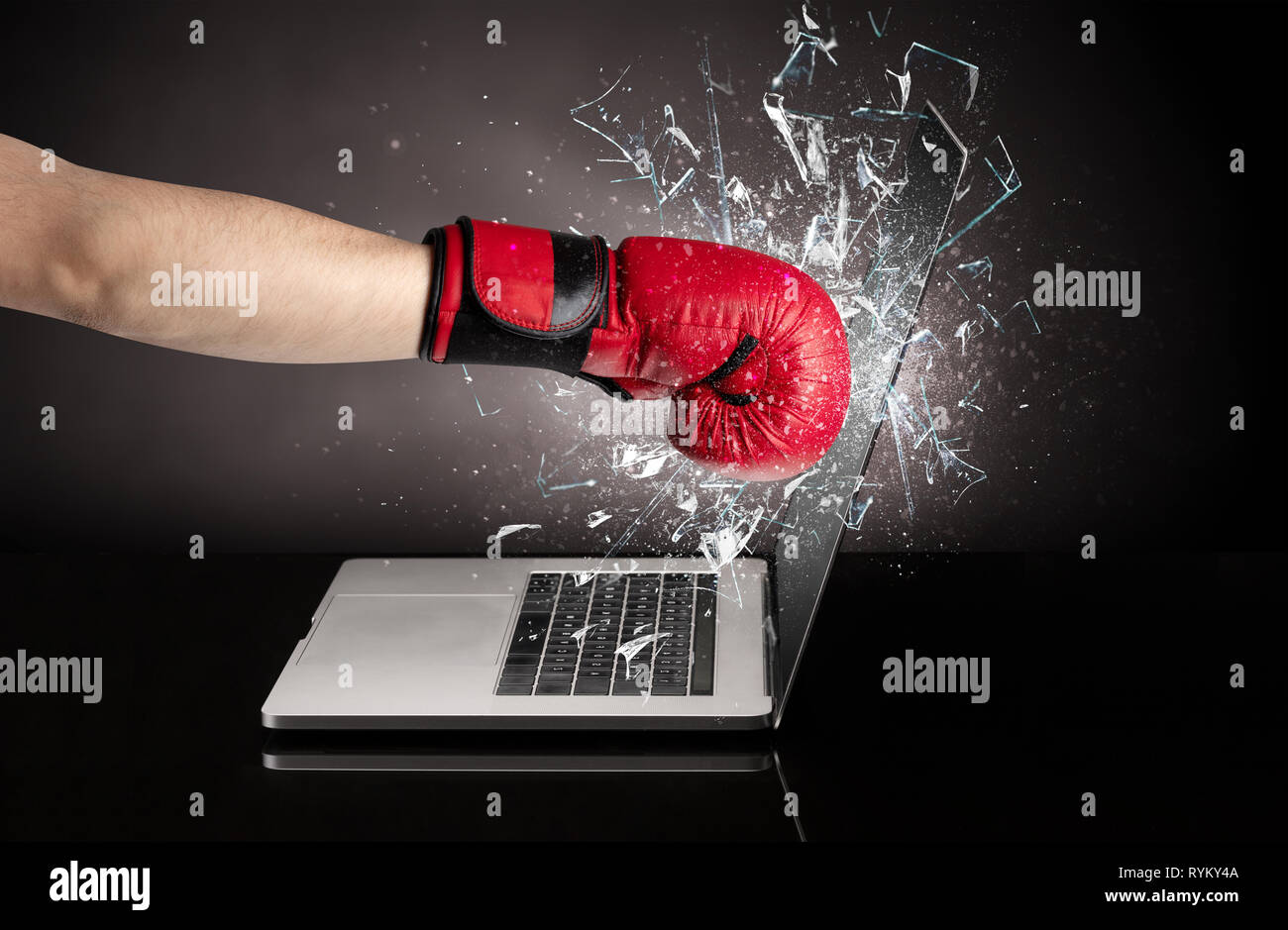 Hand hitting strongly laptop screen glass Stock Photo - Alamy