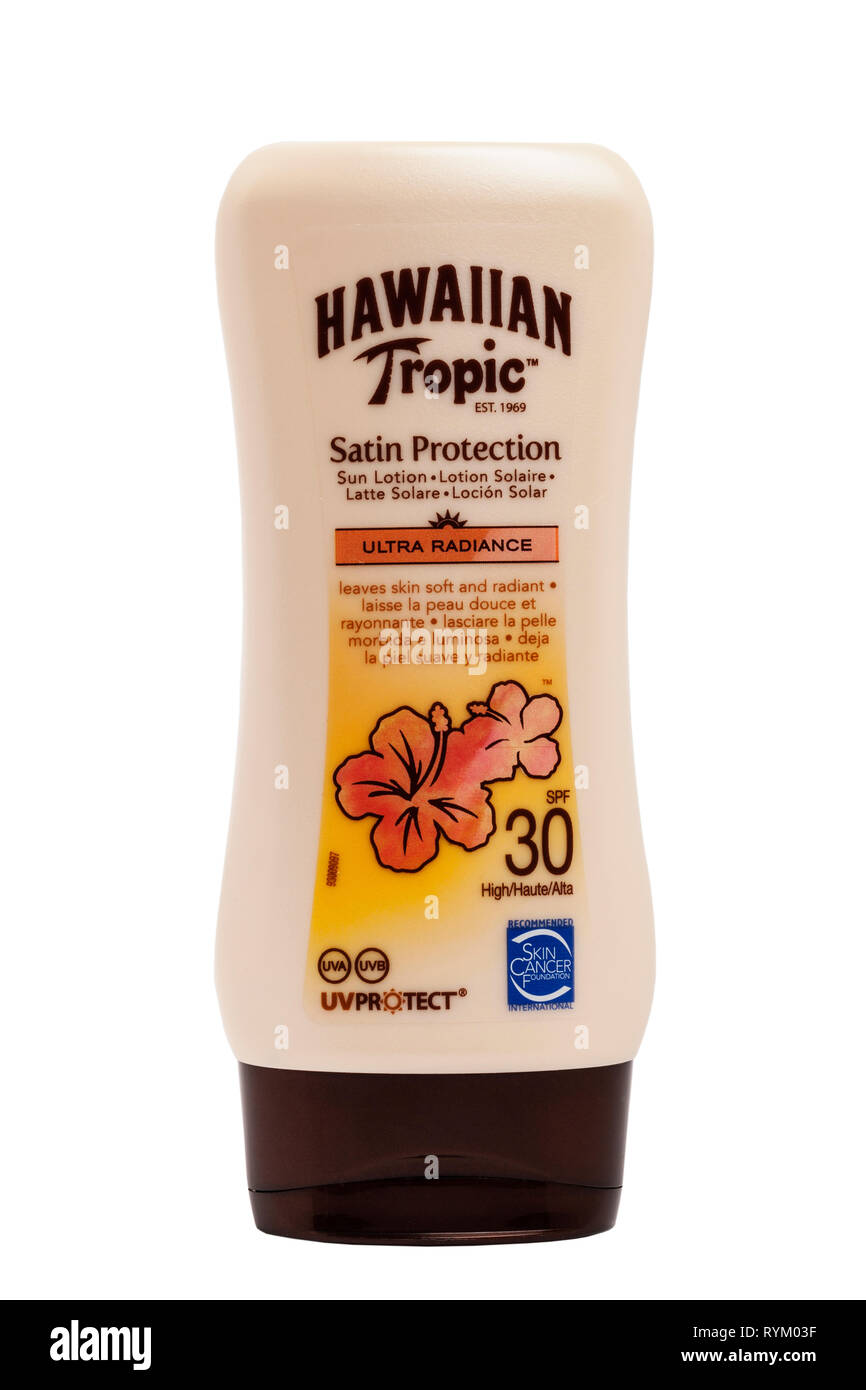 A tub of Hawaiian Tropic sun lotion cream with uv protection on a white ...