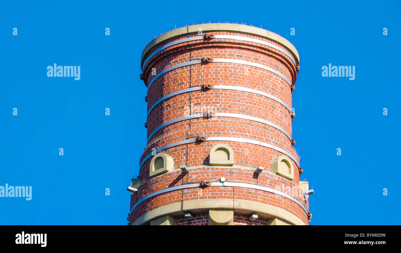 A dome tower with brick walls and a small window on it Stock Photo - Alamy