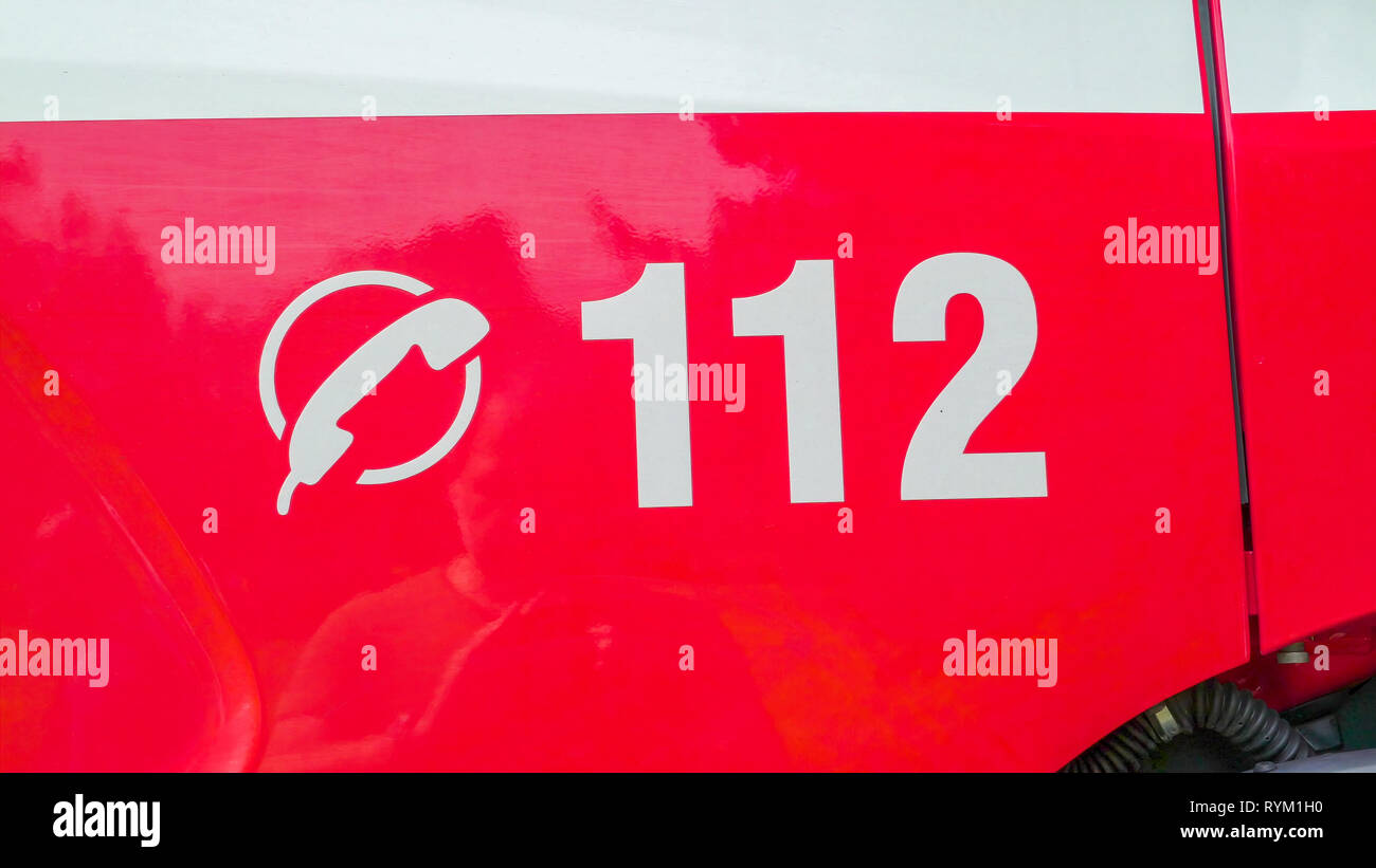 Closer look of the 112 number sign on the side of the red firetruck its ...