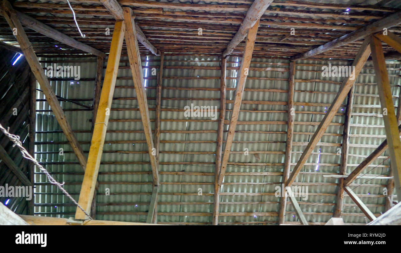 The closer look of the roof ceiling of the factory and the railings on ...