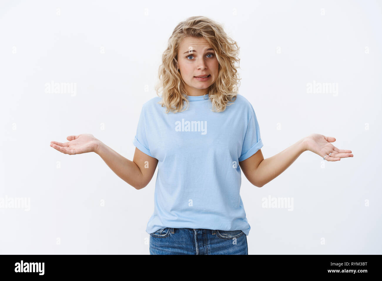 Oops sorry. Portrait of woman being guilty and awkward as making ...