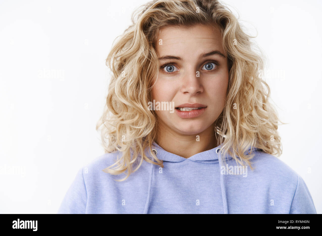 Girl feeling awkward and sorry as confessing in making mistake hum and ...