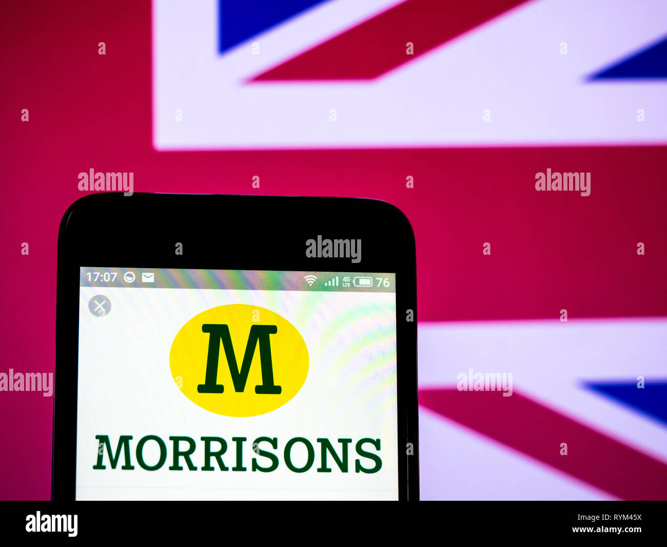 Wm Morrison Supermarkets plc logo seen displayed on smart phone Stock ...