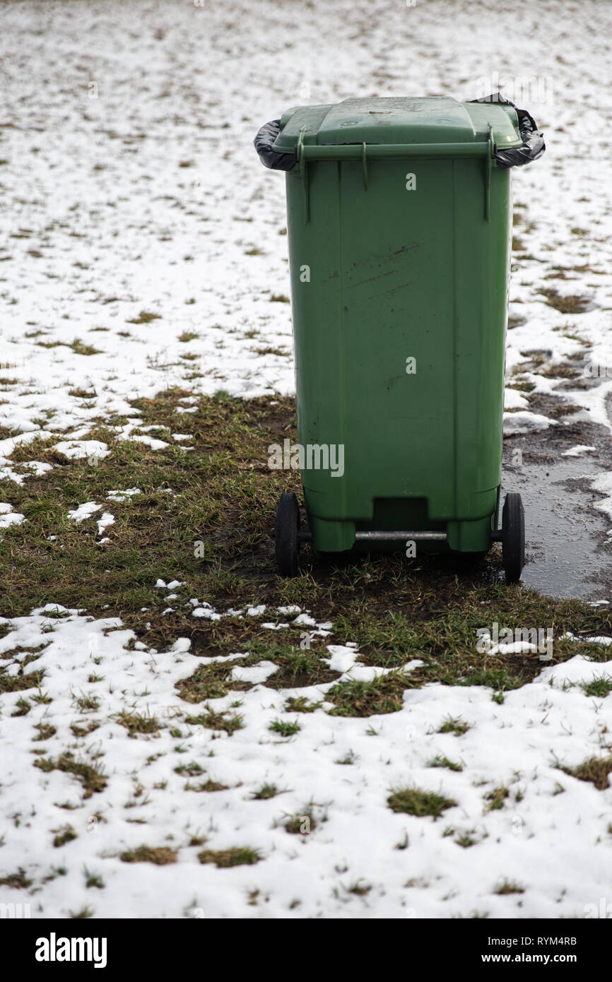 Blank ad space trash can standing in a picnic field in Winter Stock ...