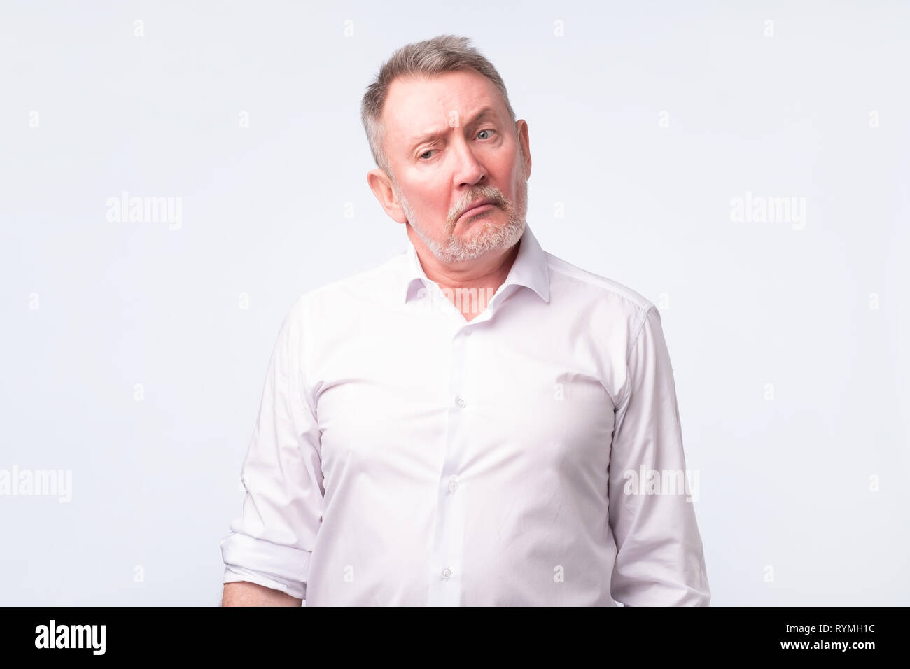 Sad old man face hi-res stock photography and images - Alamy
