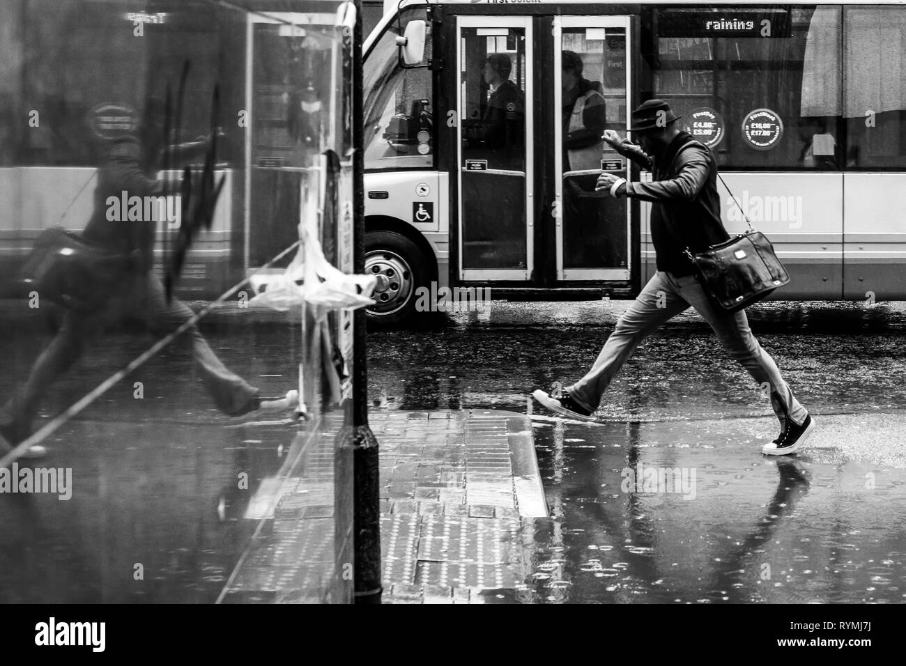 Puddle jumping Black and White Stock Photos & Images - Alamy