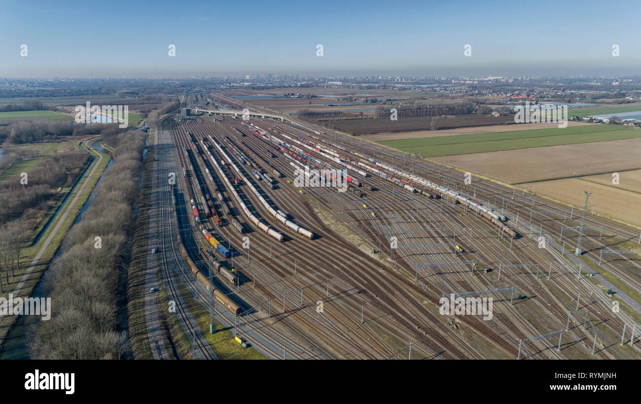 Cargo trains. Aerial view of colorful freight trains. Railway station ...