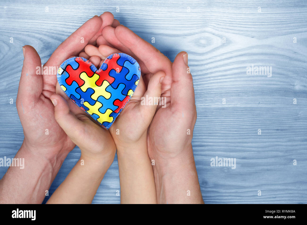 World Autism Awareness day, puzzle or jigsaw pattern on heart with ...