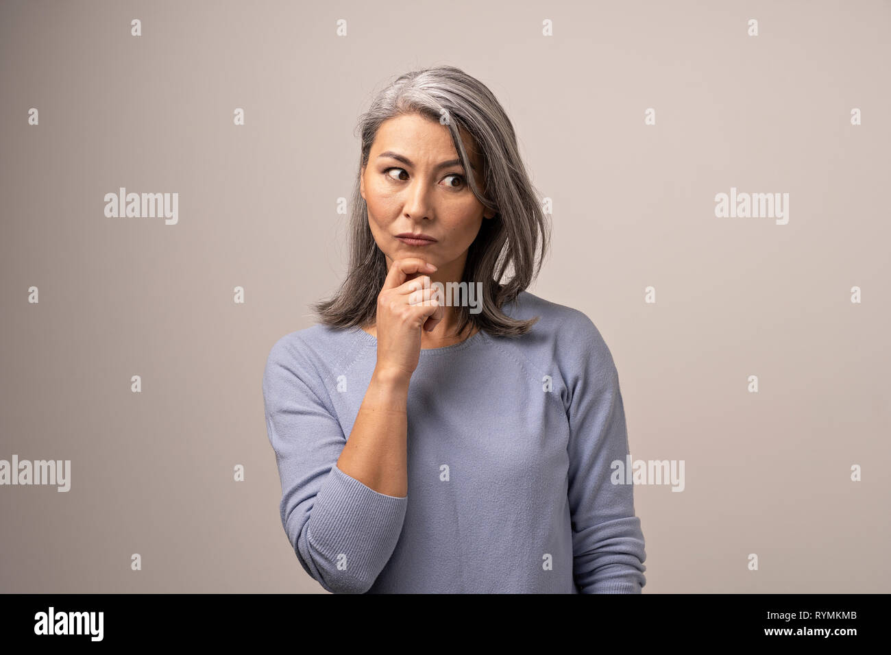 Portrait thinking cute woman hi-res stock photography and images - Alamy