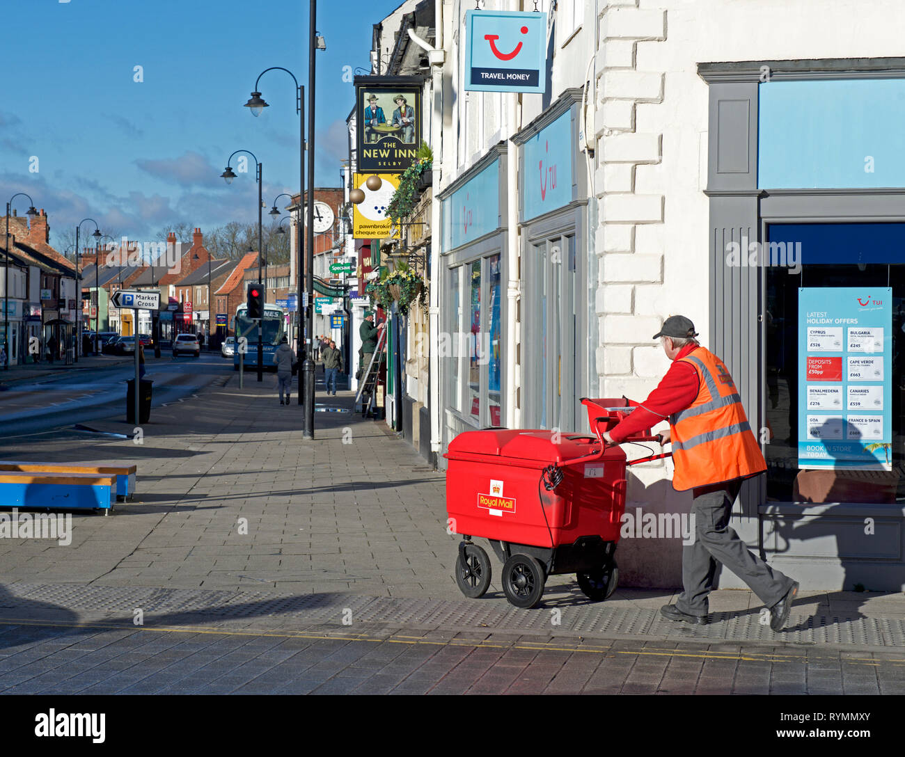 Postman in Selby, North Yorkshire, England UK Stock Photo - Alamy