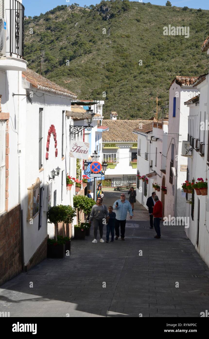 Benahavis, Spain - February 28, 2019: People at sloped street in ...