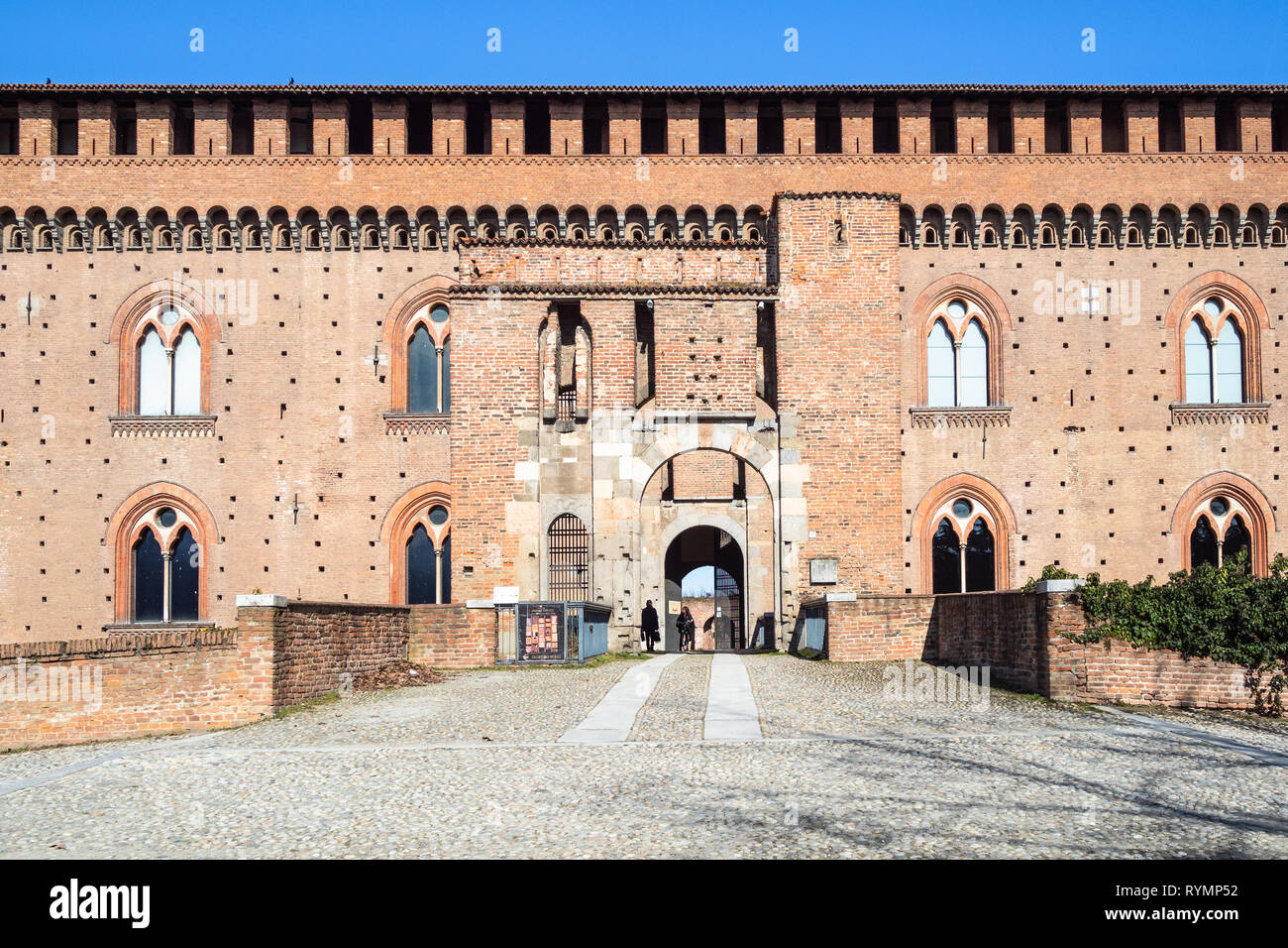 PAVIA, ITALY - FEBRUARY 22, 2019: visitors in entrance to Castello ...