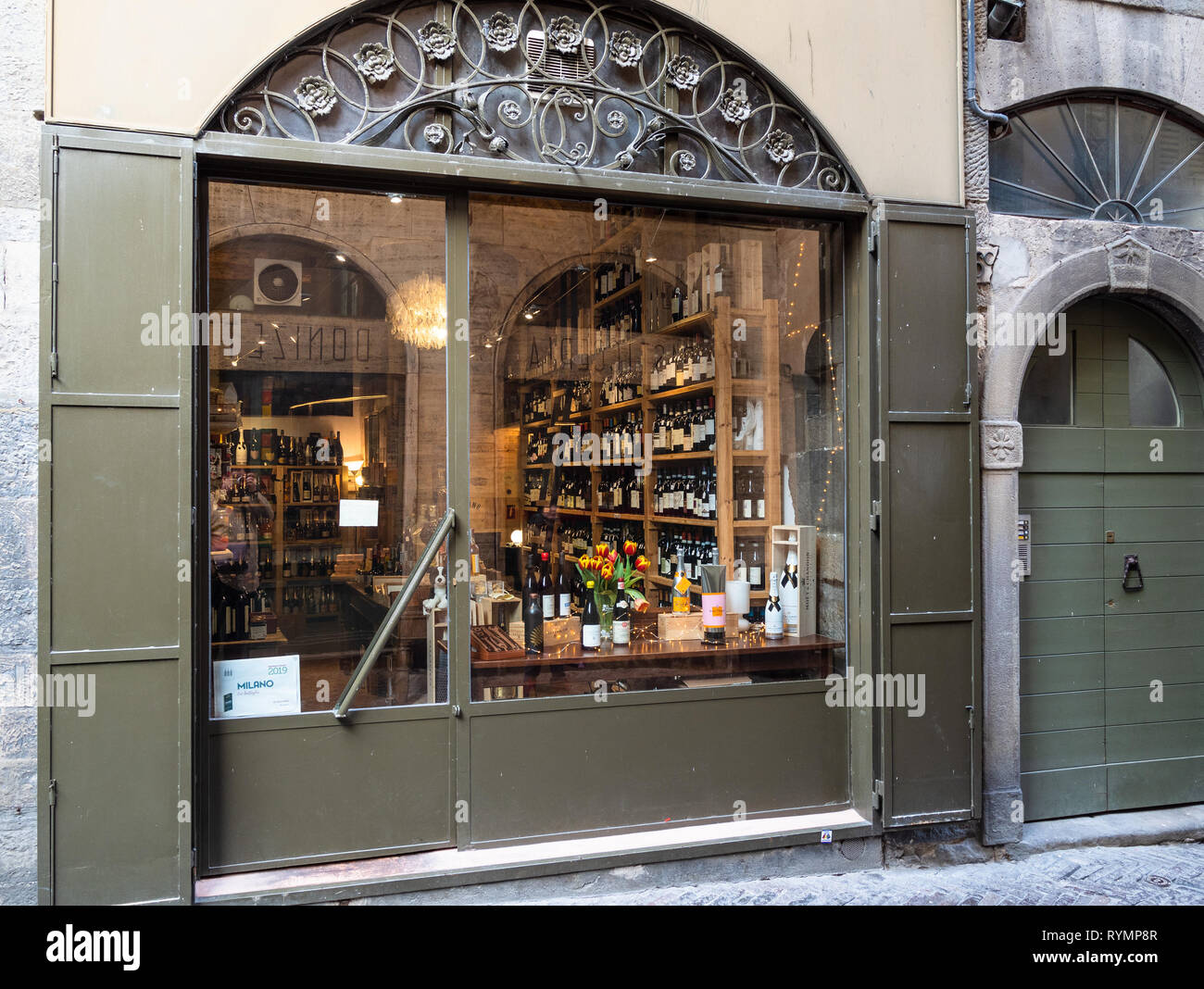 BERGAMO, ITALY - FEBRUARY 23, 2019: window of enoteca, wine shop with ...