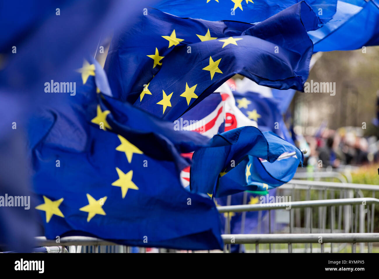 Flags of the European Union flying at a brexit march in London Stock ...