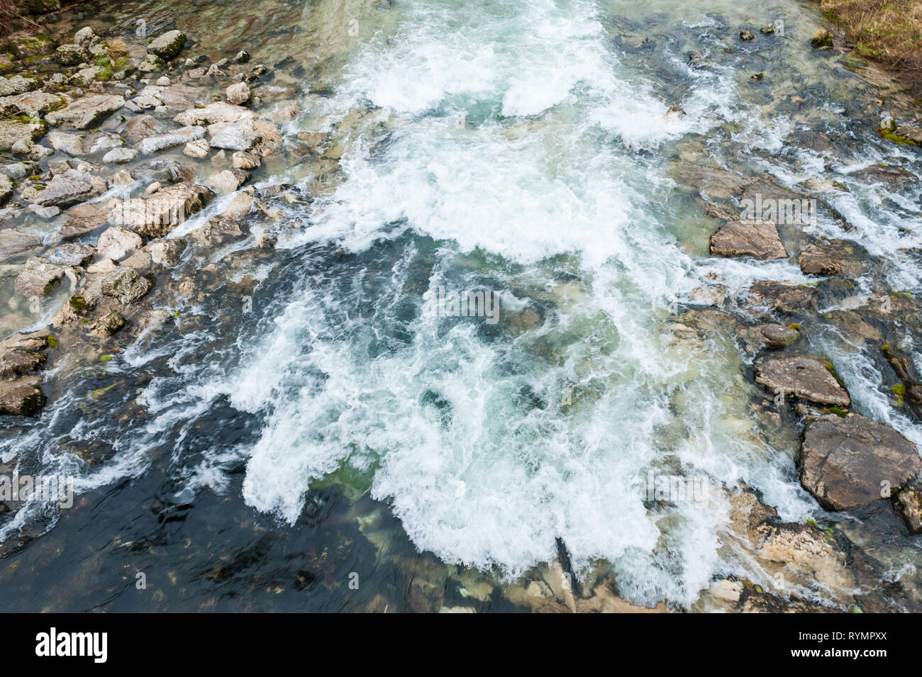 Water flowing on rocks Stock Photo - Alamy