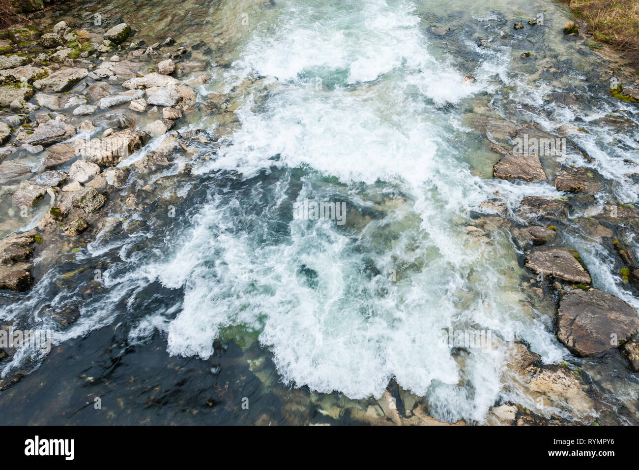 Water flowing on rocks Stock Photo - Alamy